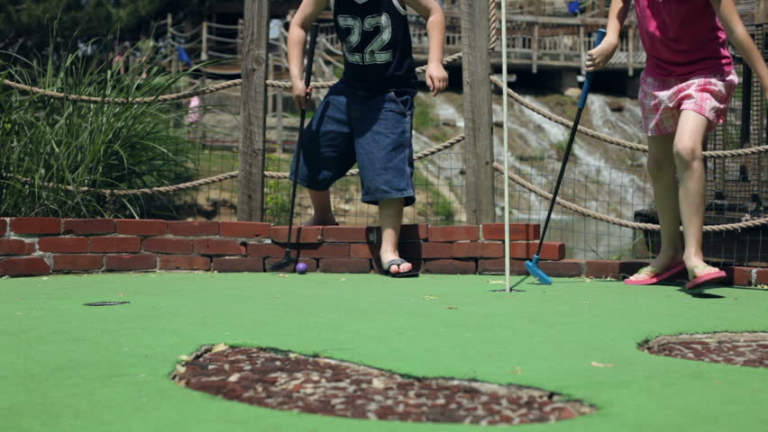 kids playing mini golf Stock Footage Video (100% Royalty-free) 1282762 ...