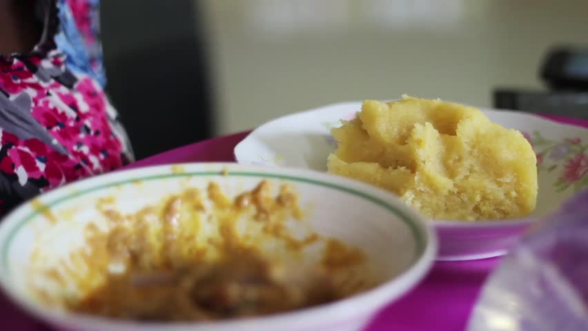 eating meal on nigerian eba egusi Stock Footage Video (100% Royalty ...