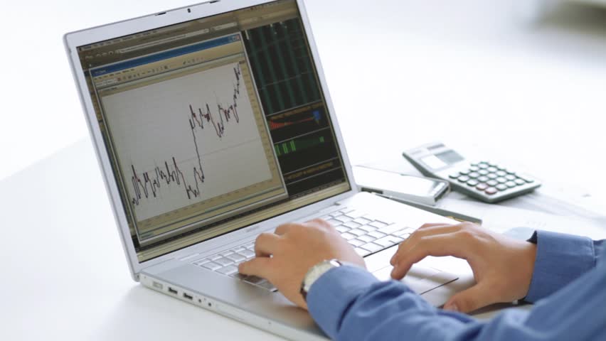 businessman checking stock market his laptop Stock Footage Video (100% ...