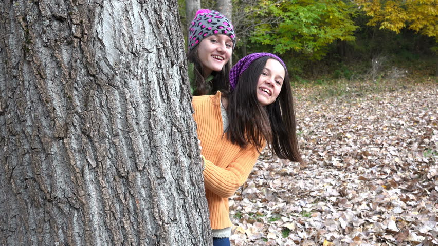 hide seek girls playing park hiding Stock Footage Video (100% Royalty ...