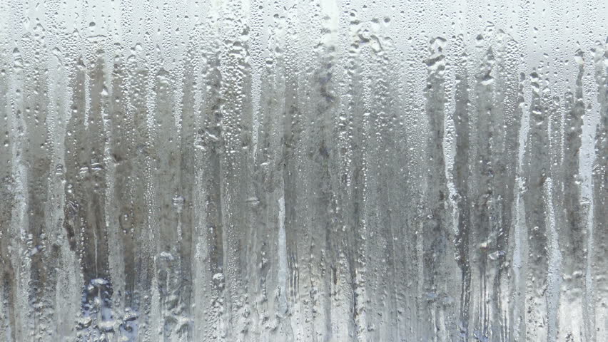 frozen water drops on glass window Stock Footage Video (100% Royalty ...