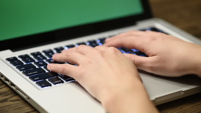 woman typing on notebook's keyboard green Stock Footage Video (100% ...