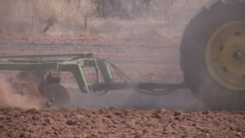 A Tractor Discing a Field. Stock Footage Video (100% Royalty-free ...