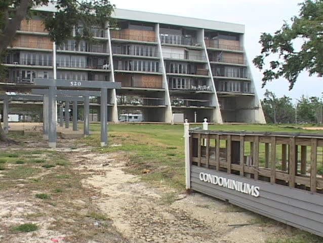 damaged apartment building partially boarded after Stock Footage Video ...