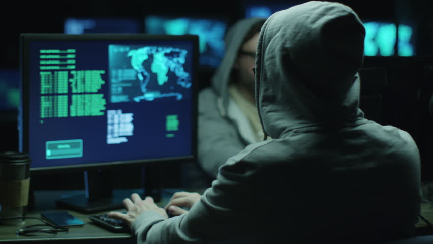 Two Hackers in Hoods Work : vidéo de stock (100 % libre de droit ...