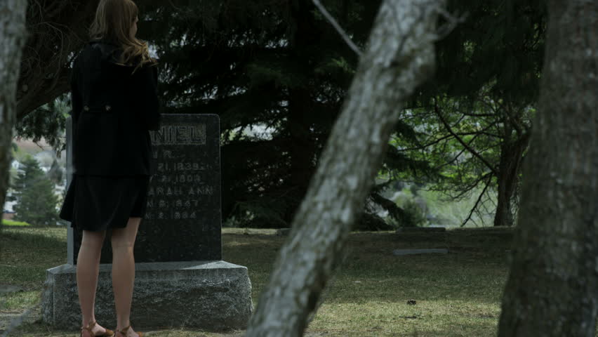 girl visits grave stone cemetery leaves Stock Footage Video (100% ...