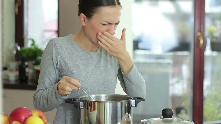 attractive young female cook tasting her Stock Footage Video (100% ...