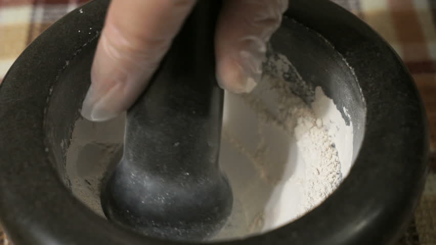 Mortar for Grinding Eggshells. Extraction Stock Footage Video (100% ...