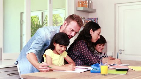 Parents Assisting Children Doing Homework Home Stock Footage Video (100 ...