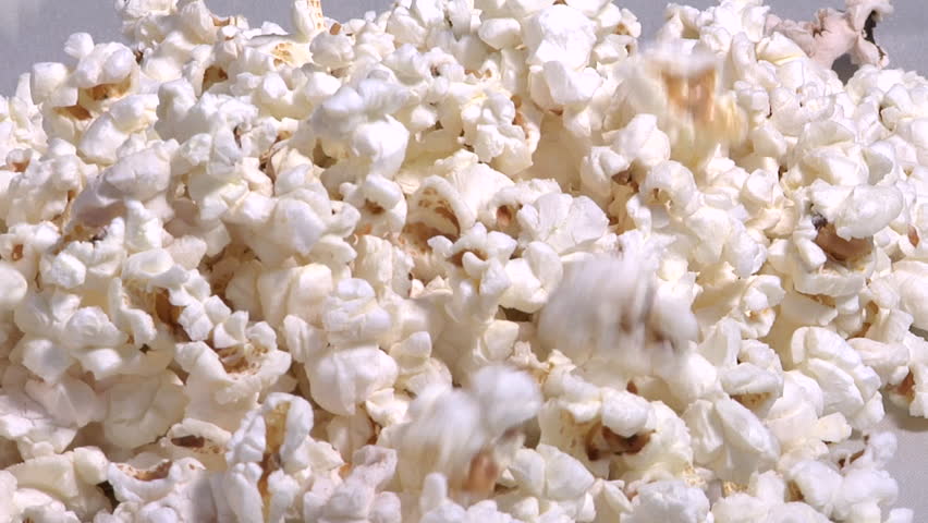 Delicious Popcorn Falling Onto a Stock Footage Video (100% Royalty-free ...