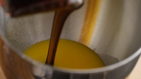 Pouring Molasses Into Mixing Bowl Stock Footage Video (100% Royalty ...