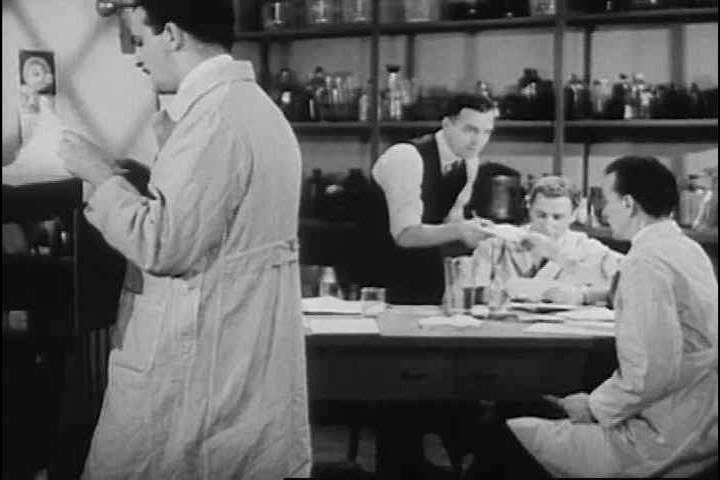 circa 1940s - scientists work lab Stock Footage Video (100% Royalty ...