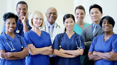 Smiling Medical Team Standing Together Outside Stock Photo (Edit Now ...