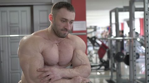 Handsome Bodybuilder Relaxing Between Training Slowly Stock Footage ...