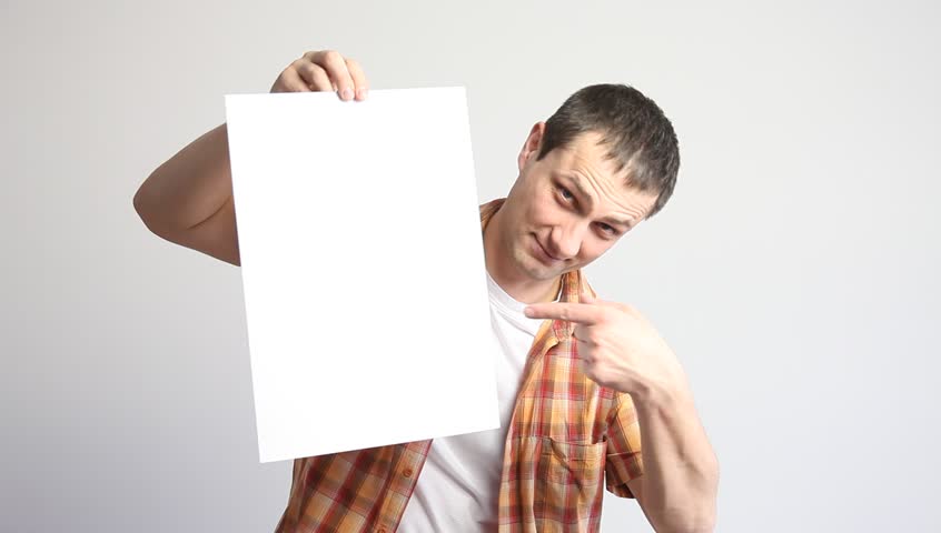 young man holding sheet paper indication Stock Footage Video (100% ...