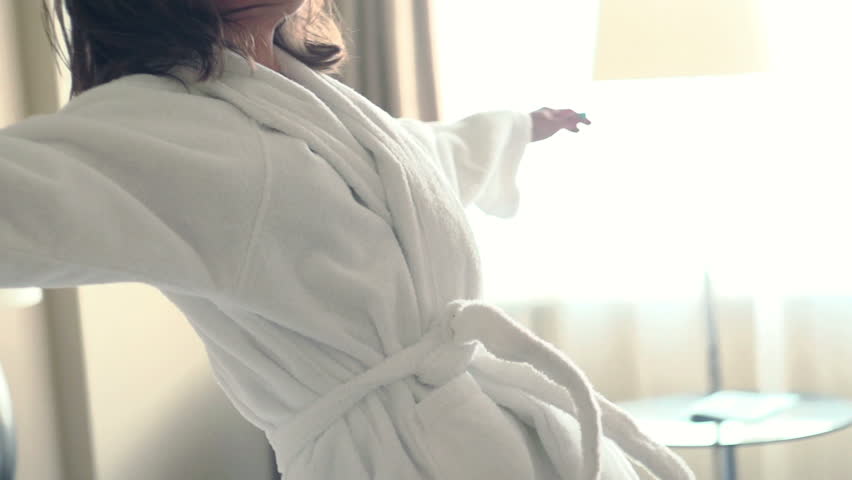 young happy woman bathrobe falling on Stock Footage Video (100% Royalty ...