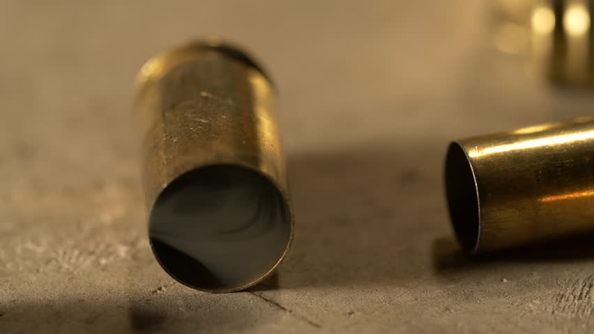 smoldering bullet shell freshly fired round Stock Footage Video (100% ...