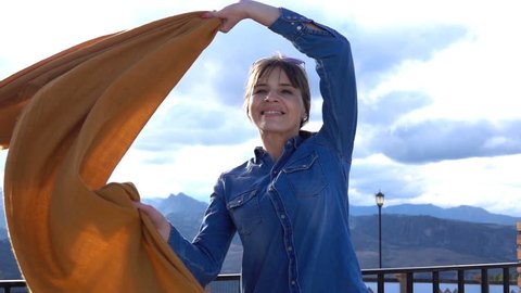 Young Woman Throwing Her Scarf Standing Stock Footage Video (100% ...