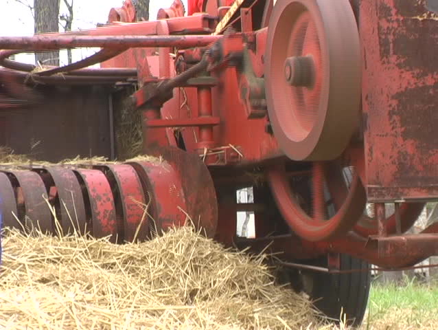 old model square hay baler operating Stock Footage Video (100% Royalty ...