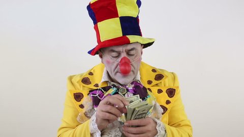 Clown Counting Money Stock Footage Video (100% Royalty-free) 15471040 ...