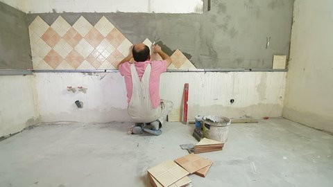 Worker Installing Tiles Kitchen Wall Rear Stock Footage Video (100% ...