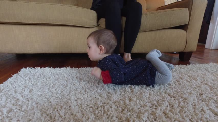 baby crawling her mother's feet on Stock Footage Video (100% Royalty ...