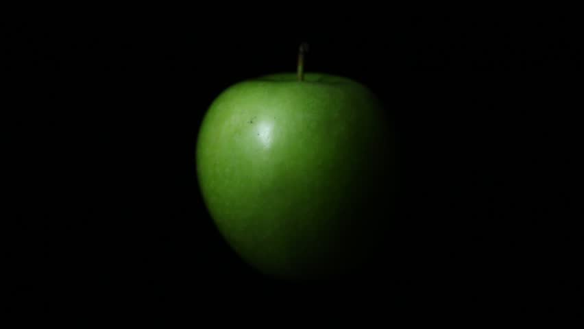 Apple Turning in Dark Stock Footage Video (100% Royalty-free) 15614251 ...