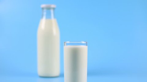 Bottle Milk Glass Milk On Blue Stock Footage Video (100% Royalty-free ...
