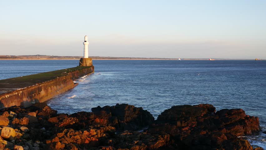 Lighthouse and Wave at Aberdeen Stock Footage Video (100% Royalty-free ...