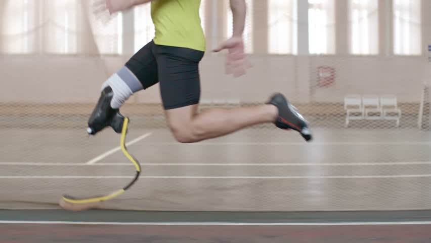 tracking shot paralympic athlete prosthetic leg Stock Footage Video ...