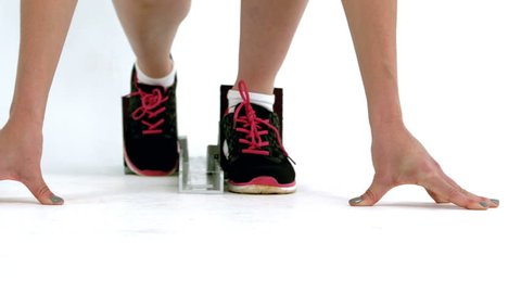 Feminine Runner Taking Off Finish Line Stock Footage Video (100% ...