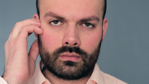 341 Scratch his beard Stock Video Footage - 4K and HD Video Clips ...