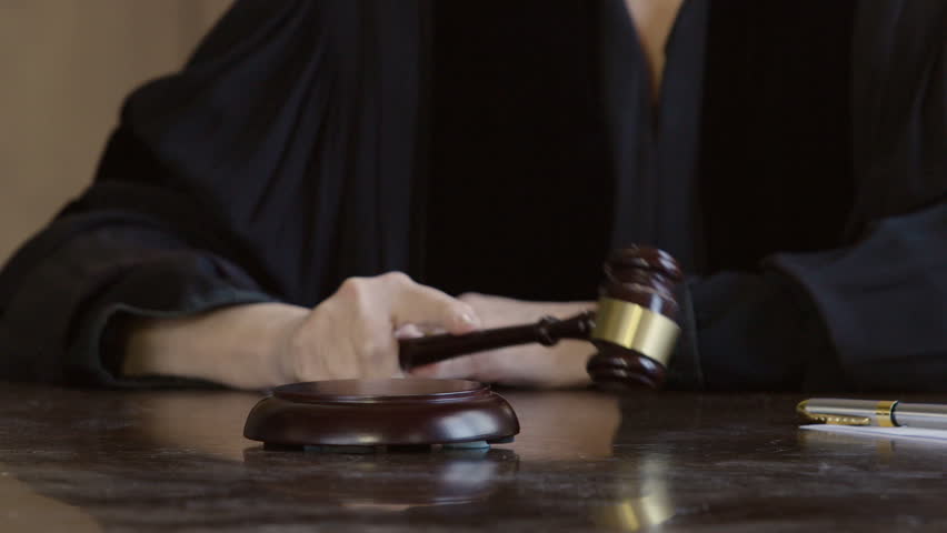 judge banging gavel on courtroom desk Stock Footage Video (100% Royalty ...