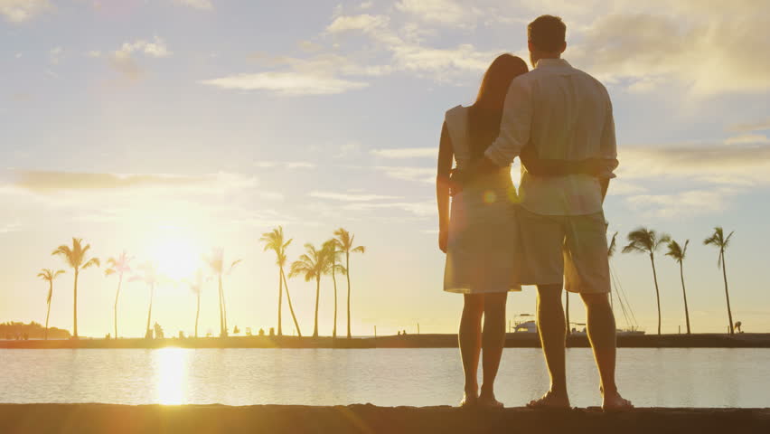 Two people watching sunrise over the ocean image - Free stock photo ...