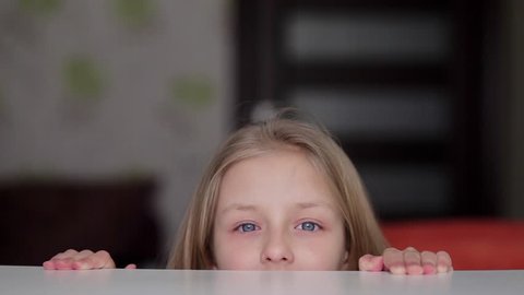 Girl Coming Looking Under Table Turning Stock Footage Video (100% ...