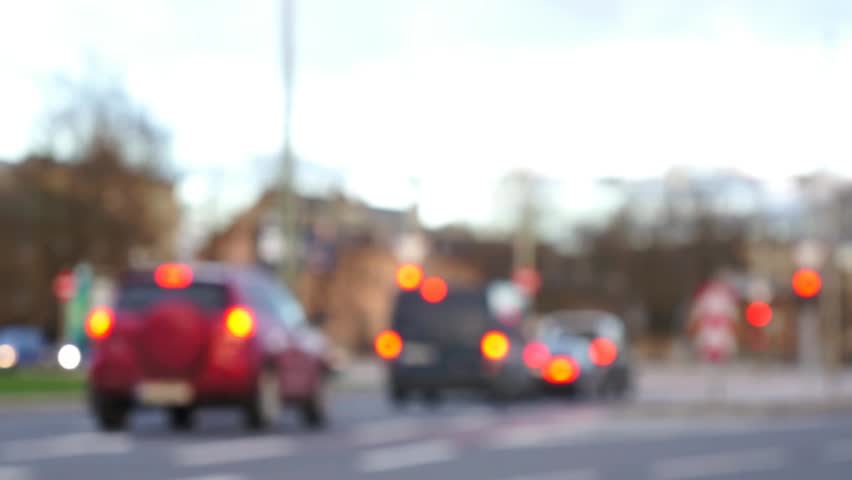 unfocused cars on intersection red traffic Stock Footage Video (100% ...