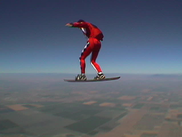 skydiver performs skyboarding maneuvers Stock Footage Video (100% ...