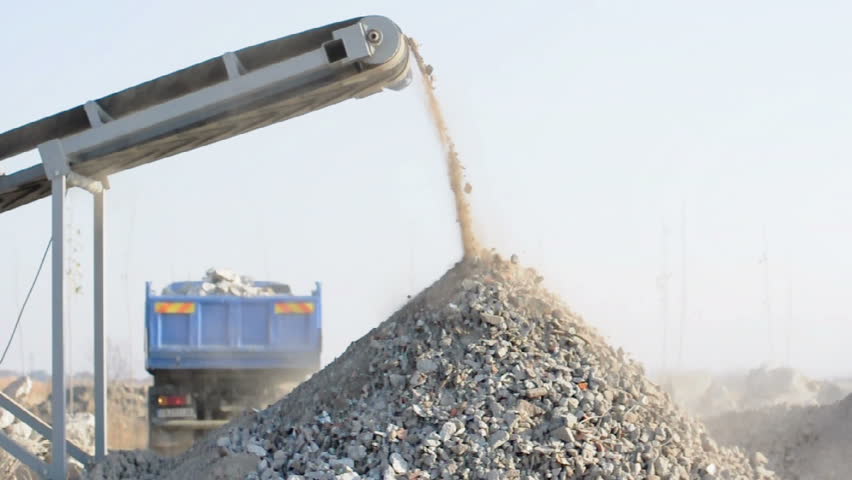 machine crushing stone falling rocks Stock Footage Video (100% Royalty ...