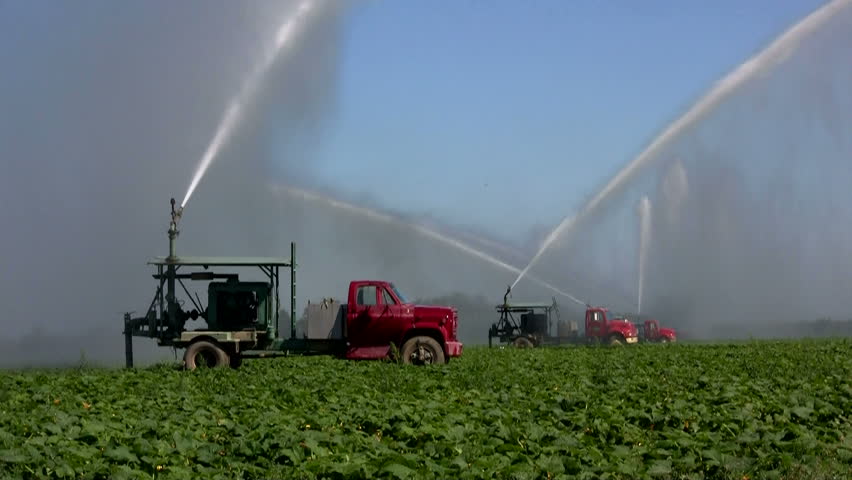 irrigation trucks watering land Stock Footage Video (100% Royalty-free ...