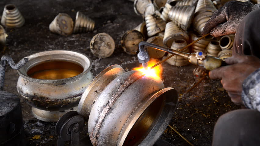 craftsman welding brass jars handicrafts traditional Stock Footage ...