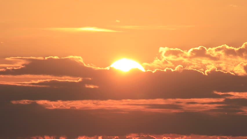 sunrise timelapse sun rising through clouds Stock Footage Video (100% ...