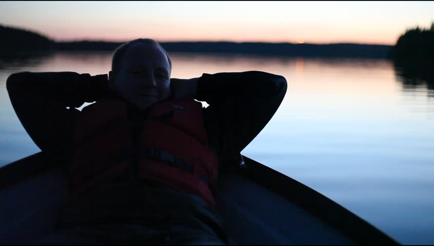 resting man on boat wearing safety Stock Footage Video (100% Royalty ...