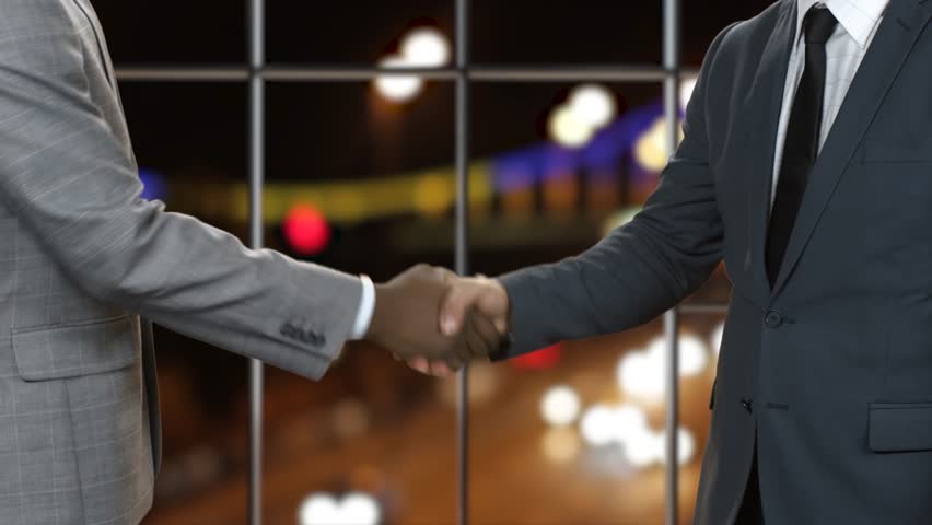 businessman shakes black man's hand handshake Stock Footage Video (100% ...