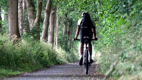 Young Man Cycling Over Bicycle Trail Stock Footage Video (100% Royalty ...