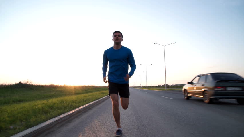 The Guy Runs Along the : vidéo de stock (100 % libre de droit) 17541919 ...