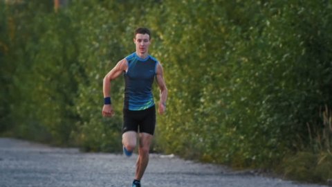 Road Runner Man Running Park Dusk Stock Footage Video (100% Royalty ...