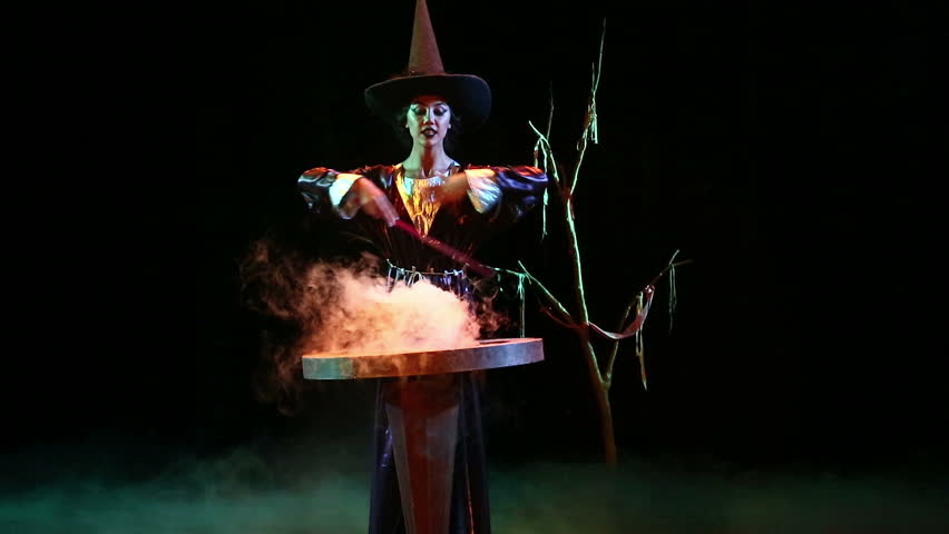 woman doing magic on dark background Stock Footage Video (100% Royalty ...