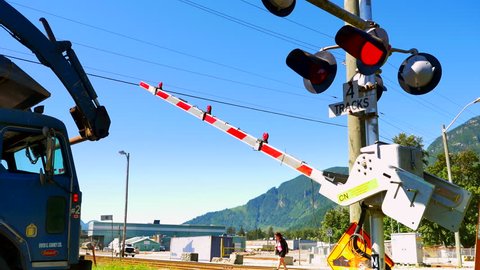 4k Crossing Signal Barrier Bar Rises Stock Footage Video (100% Royalty ...