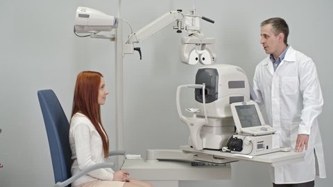 Optometrist Using Modern Automatic Refractometer Measure Stock Footage ...