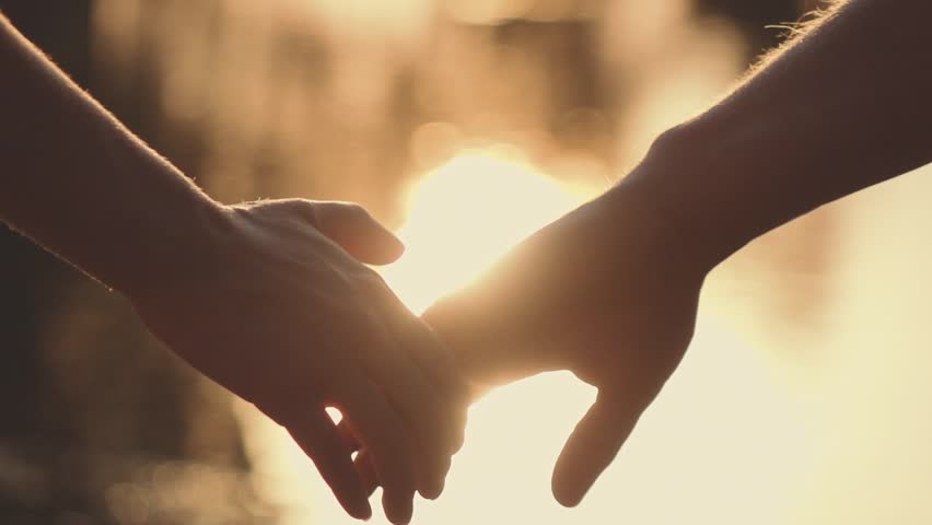close two lovers joining hands slow Stock Footage Video (100% Royalty ...